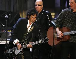 Pictures of Rolling Stones members with other famous people